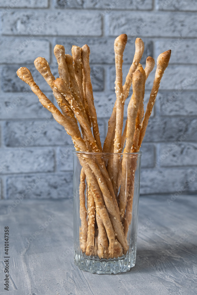 Bread sticks, italian grassini, homemade snacks with sesame seeds and ...