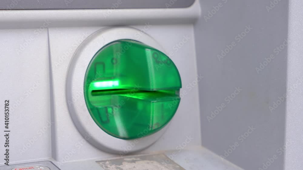 Green light flashes in the ATM card reader to indicate that it is ready ...