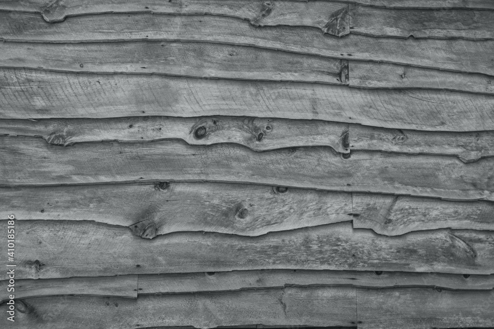 Live edge boards on an old barn. Stock Photo | Adobe Stock