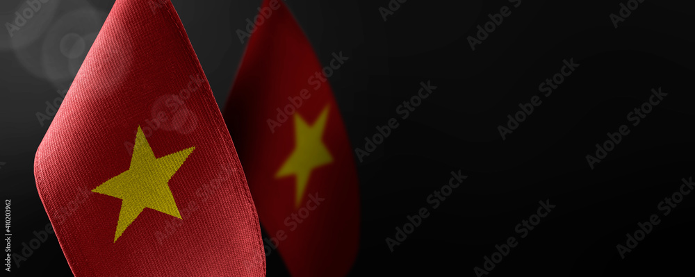 Small national flags of the Vietnam on a dark background Stock Photo ...