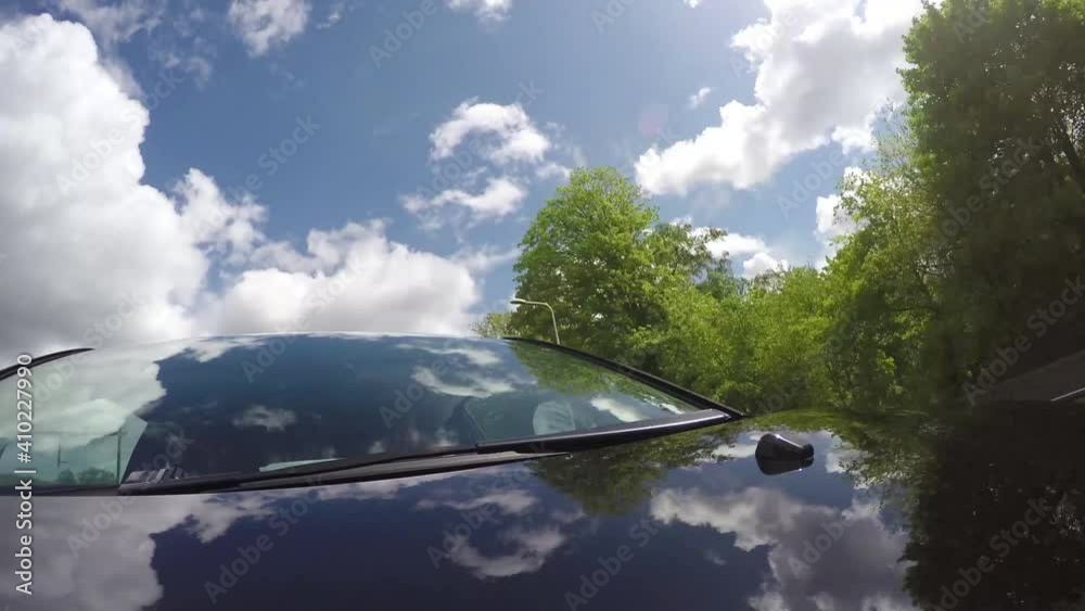 Low profile hood view looking backwards on small electric vehicle ...