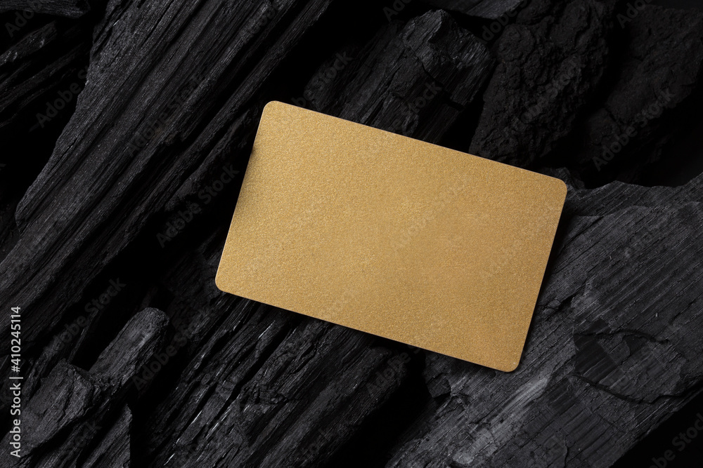 Blank gold gift card on charcoal, template for mockup design. Beauty ...