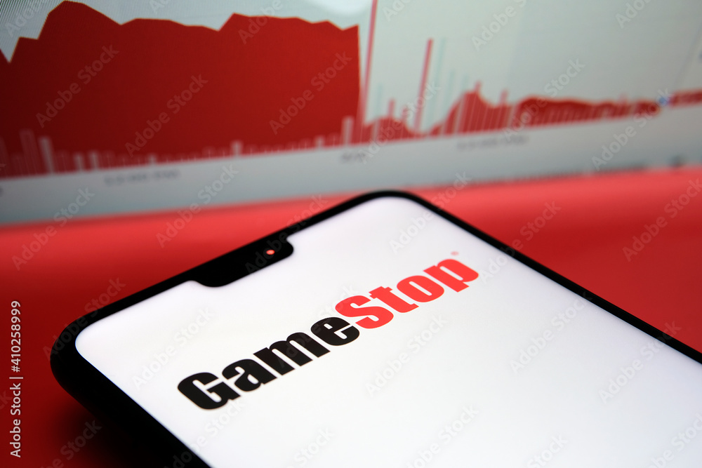 GameStop Corp logo seen on the smartphone and the real chart of ...