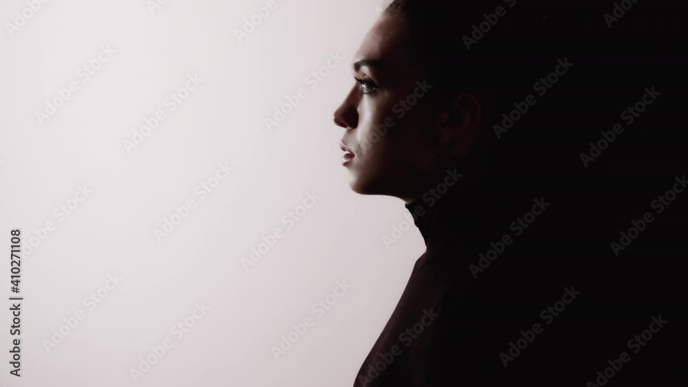 Female silhouette. Domestic violence. Abuse harassment. Dark contrast ...