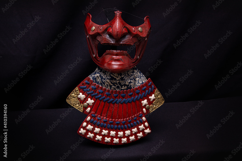 menpo samurai mask with a black background Stock Photo | Adobe Stock