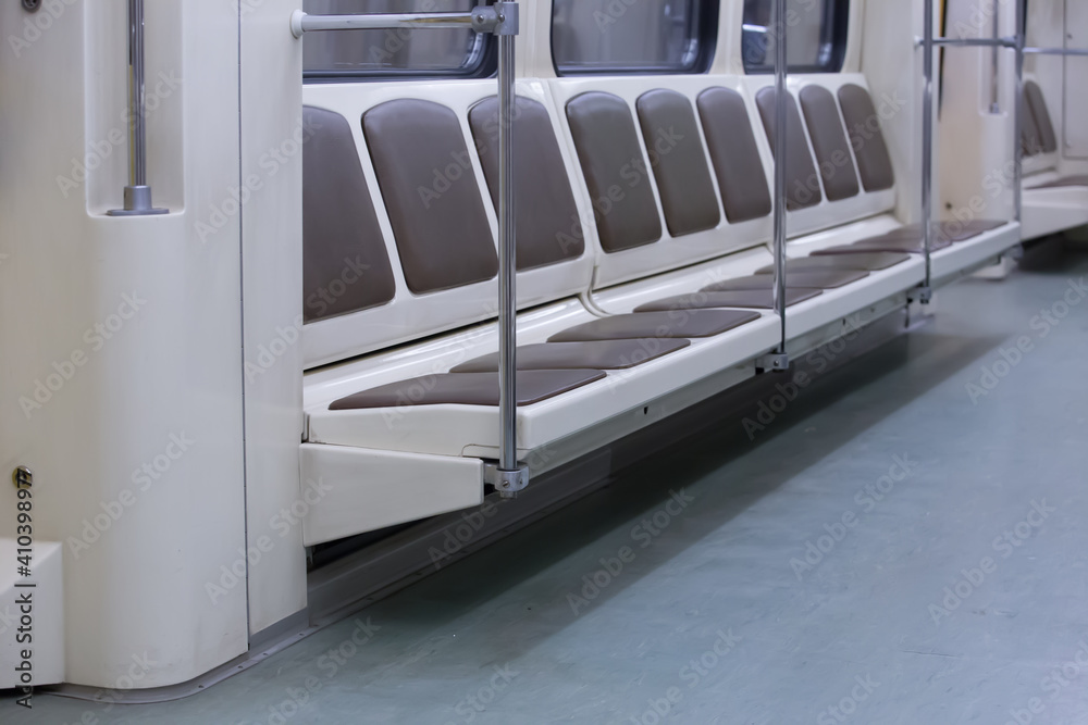 seats in a subway car close-up. Stock Photo | Adobe Stock