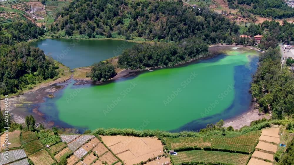 Beautiful green color Lake Warna at Dieng Plateau Java, Indonesia ...