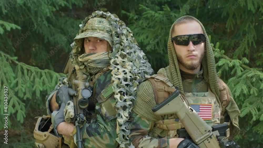 Medium close-up portrait of caucasian military men in camouflage ...