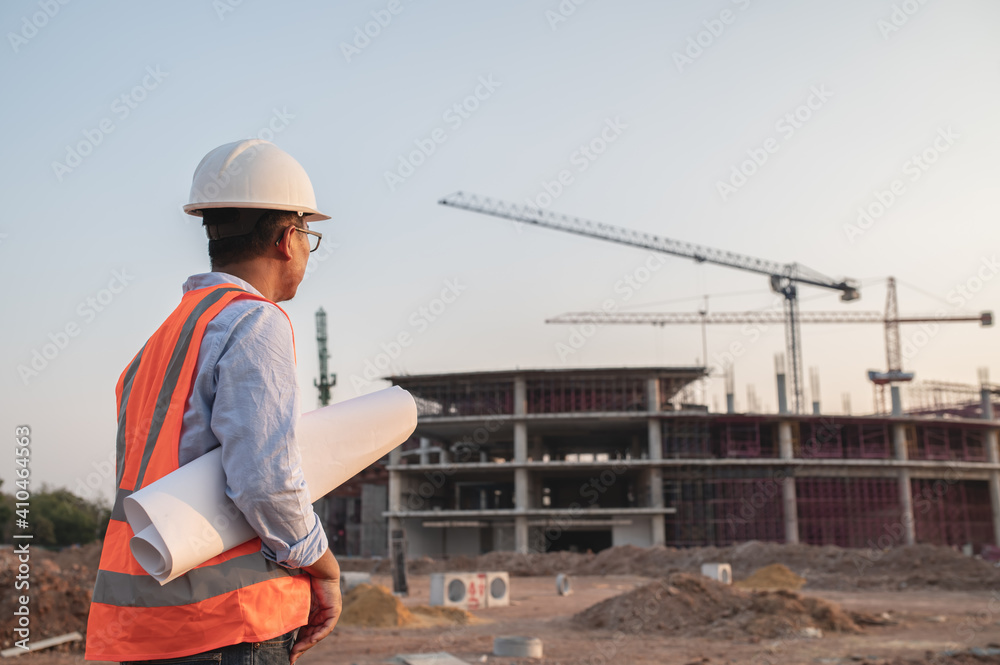 Asian engineer working at site of a large building project,Thailand ...