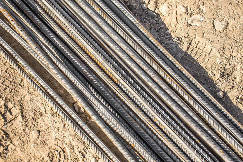 Rebar on the ground at a construction site Stock Photo | Adobe Stock