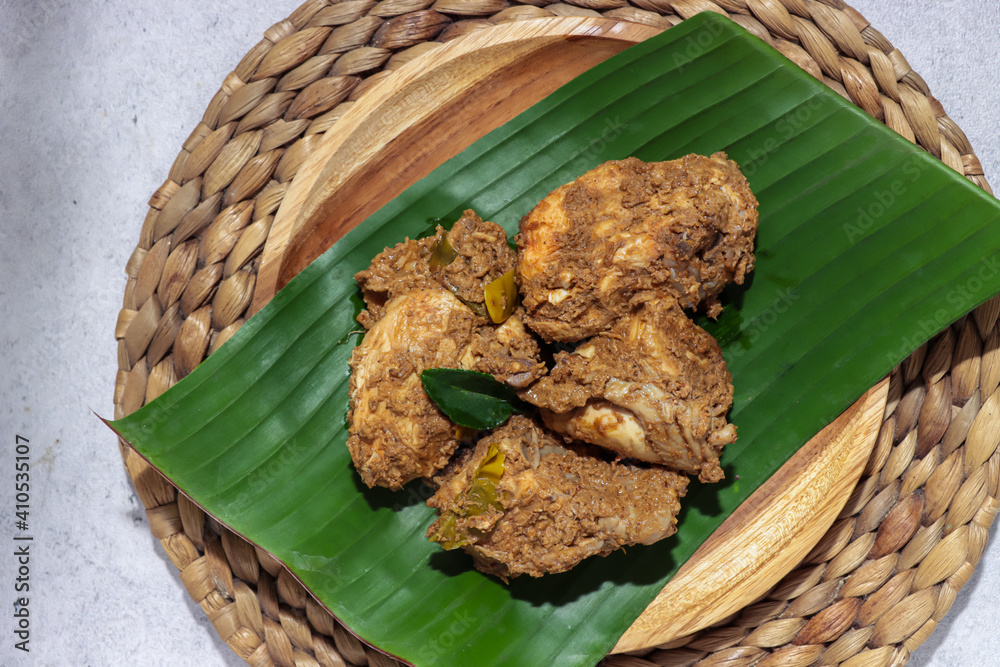 Rendang ayam or chicken rendang is a traditional dry curry delicacy ...