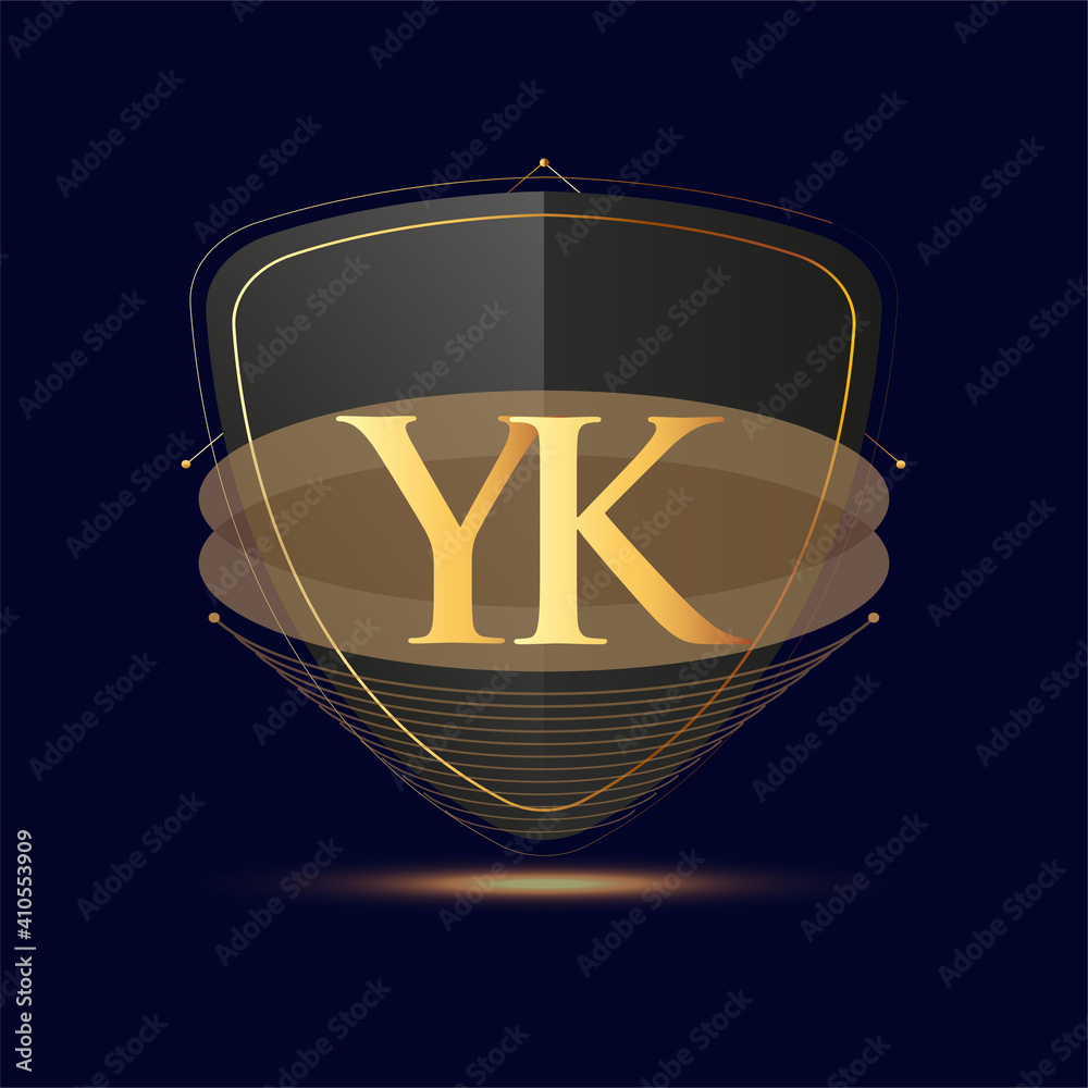 Initial logo letter YK with shield Icon golden color isolated on dark ...