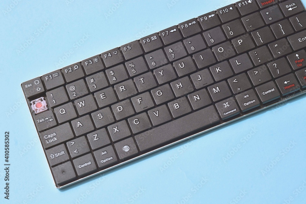 Black and broken keyboard with broken button with blue background Stock ...