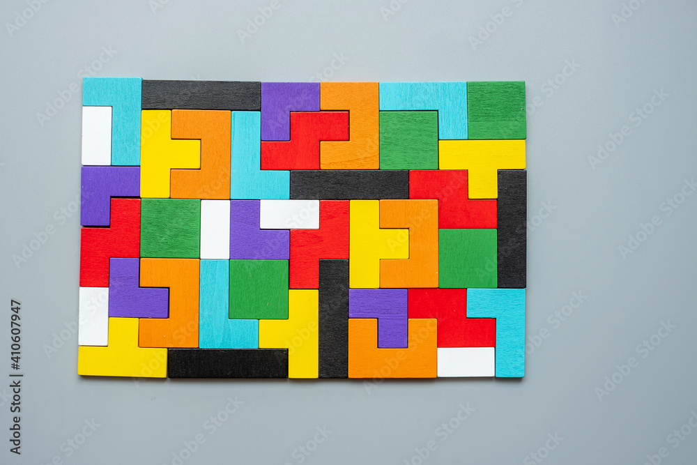 geometric shape block with colorful wood puzzle piece background ...