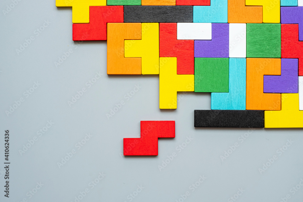 geometric shape block with colorful wood puzzle piece background ...