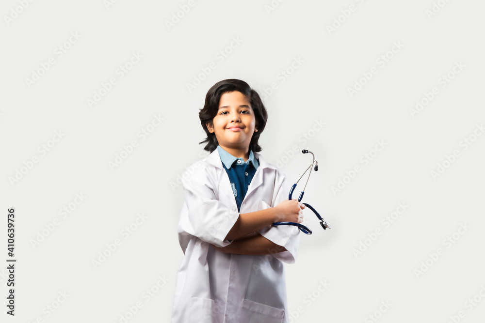 Indian asian kid doctor standing against white background Stock Photo ...