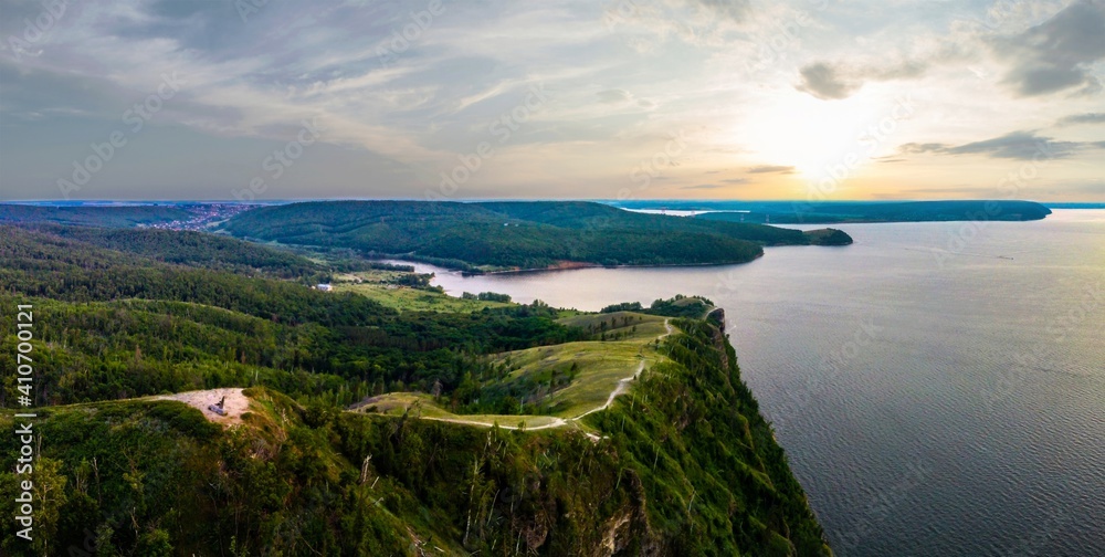 Aerial view of Zhiguli mountains with green trees and Volga river in ...