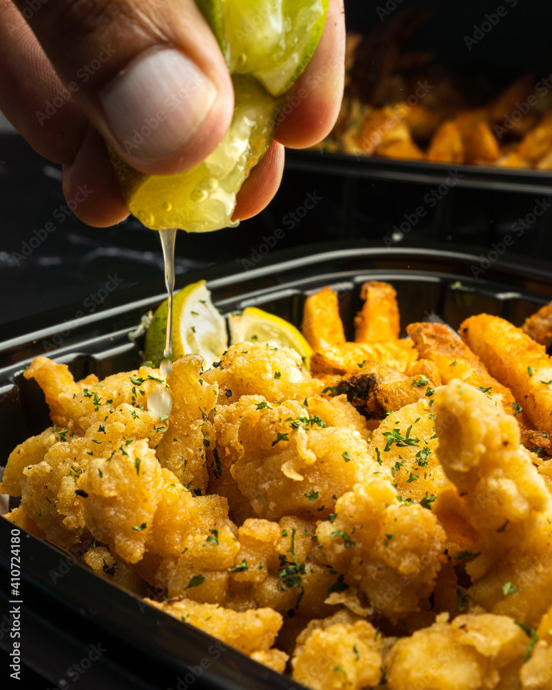 Conch crips pop corn fries lime squeezed to go Stock Photo | Adobe Stock