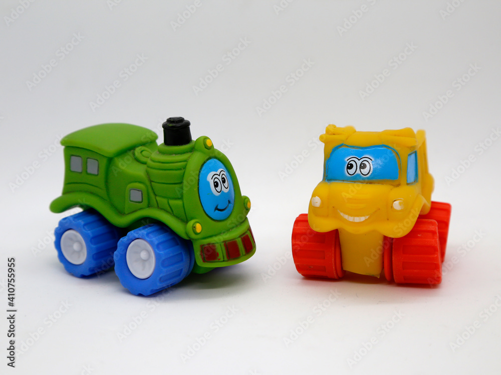 Train and truck for children with human faces. Train with a friendly ...