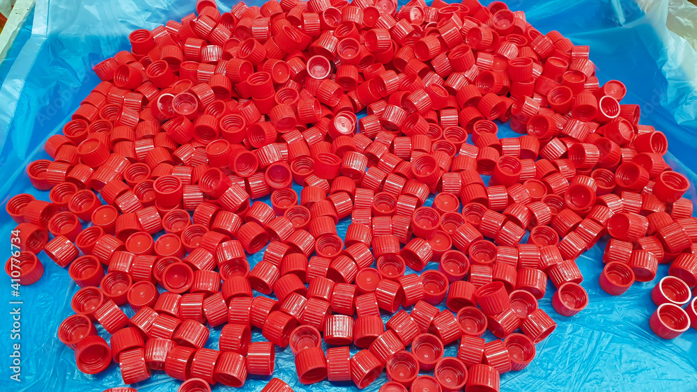 Inside- bottle cap with screw lock, used to cover parts of plastic ...