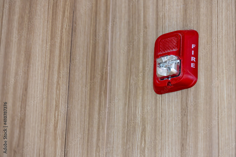 A fire alarm with built in strobe light to alert in case of fire. A ...
