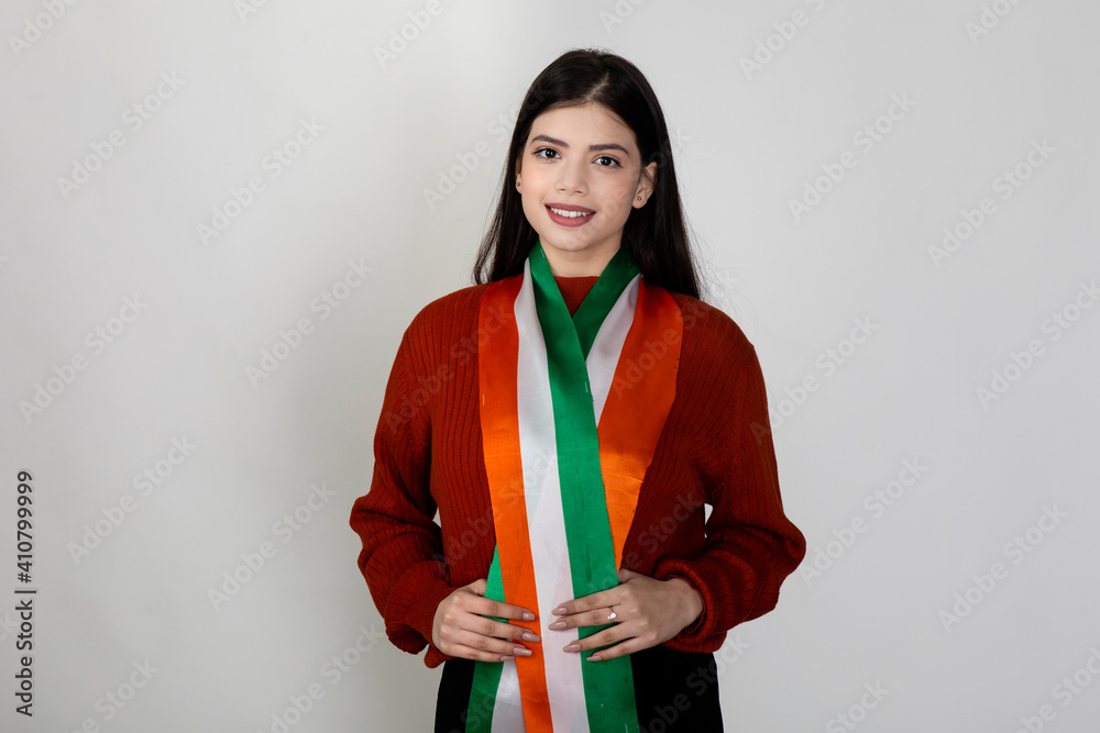 Portrait of a young beautiful female wearing around her neck a long ...