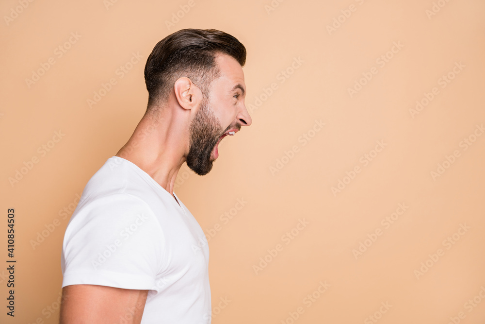 Profile side photo of young handsome man unhappy angry mad crazy yell ...