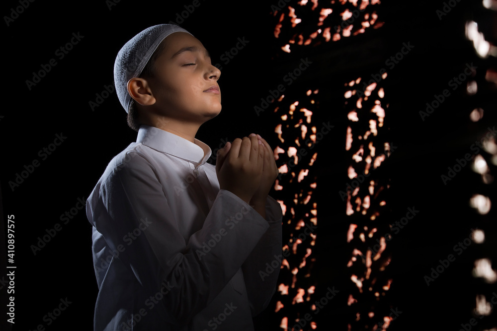 Muslim Boy praying Stock Photo | Adobe Stock