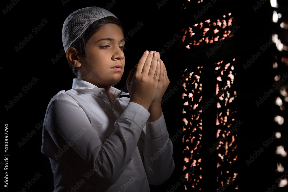 Muslim Boy praying Stock Photo | Adobe Stock