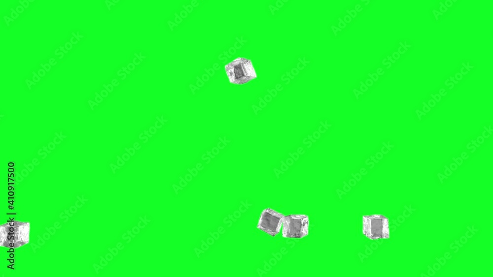 Frozen ice cubes for cocktails rain falling to the floor on green ...