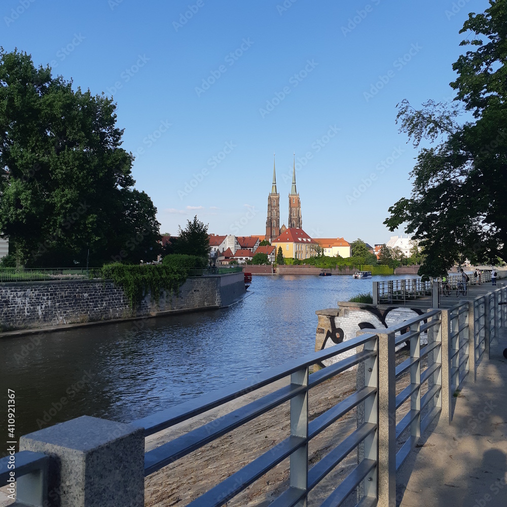 Street architecture in Poland, Wroclaw. Wroclaw river that flows to the ...