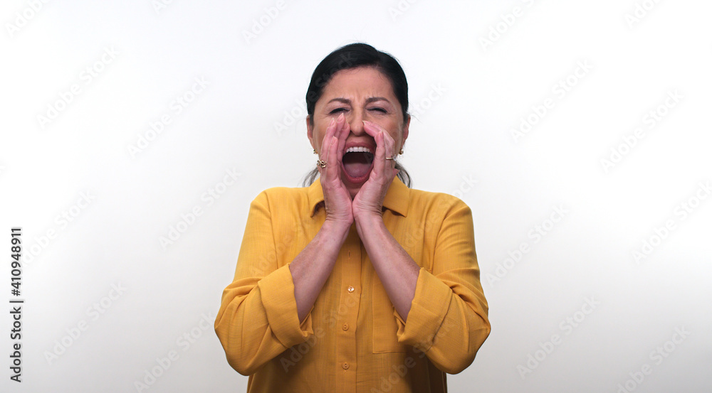 Angry, irritated old woman with an angry face looking angry and ...