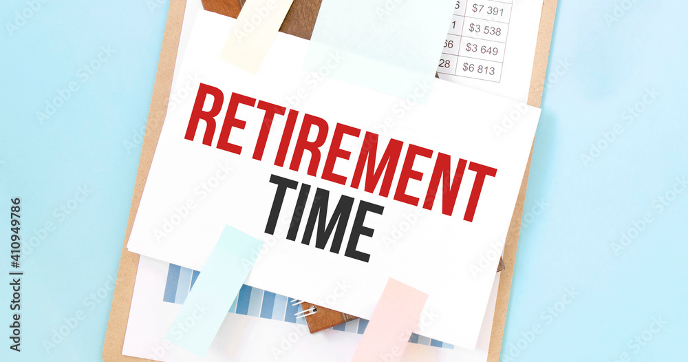 Paper plate with text retirement time. Diagram, notepad and blue ...