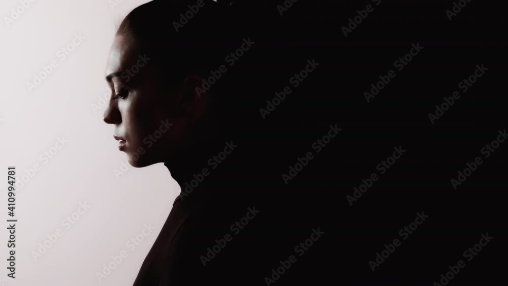 Female silhouette. Woman abuse. Humiliation assault. Dark contrast ...
