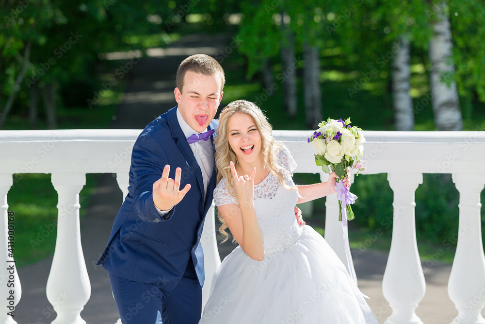 Sunny summer wedding day. Russian newlyweds, blonde bride and groom ...