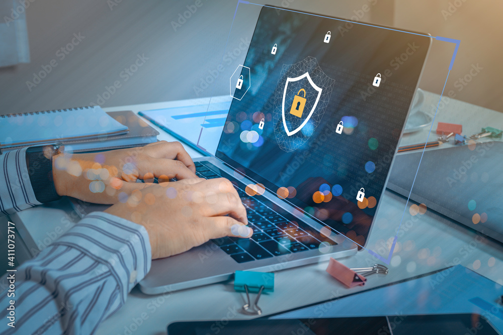 Person using a Laptop Computer with data protection, Cyber security ...