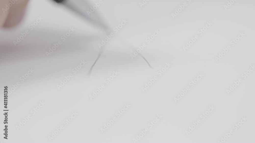 Extreme close-up shot of a hand drawing a technical draft. The camera ...