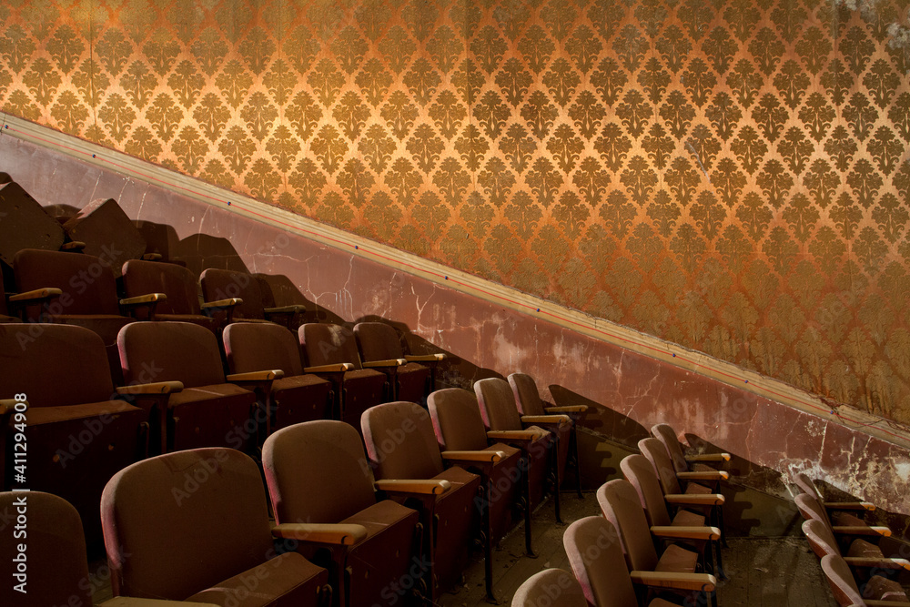 Rows of decaying seats inside an empty abandoned theater Stock Photo ...