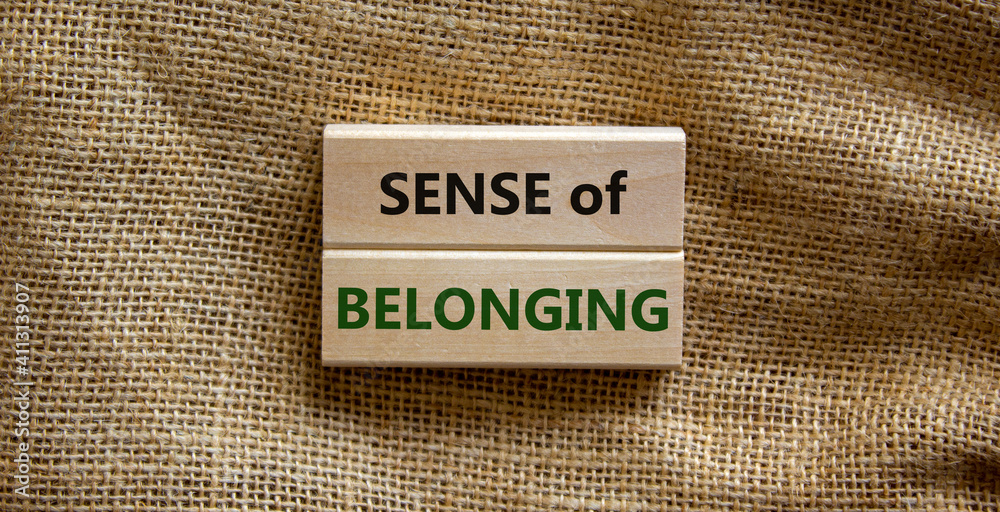 Sense of belonging symbol. Wooden blocks with words 'sense of belonging ...