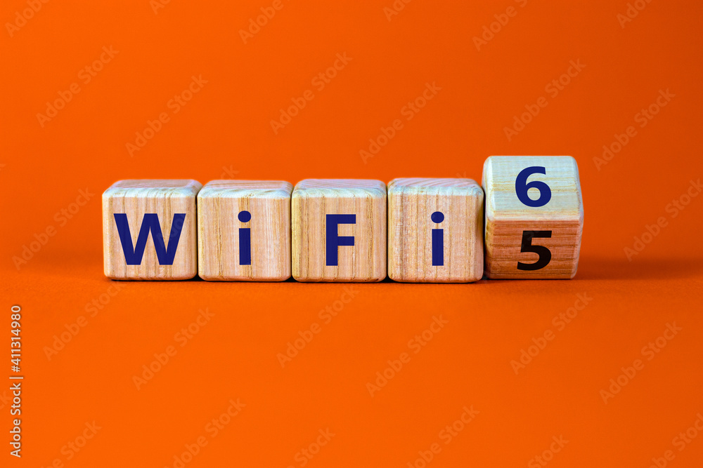 WiFi 5 or 6 symbol. Turned a wooden cube and changed the words WiFi 5 ...