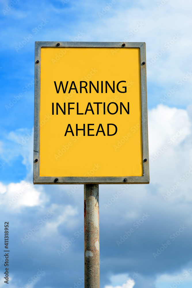 Yellow sign with blue sky background with the message "WARNING ...