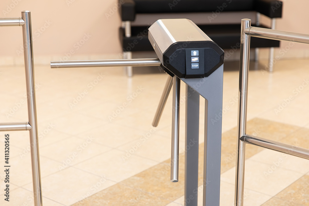 The turnstile is a passageway to the enterprises in the building ...