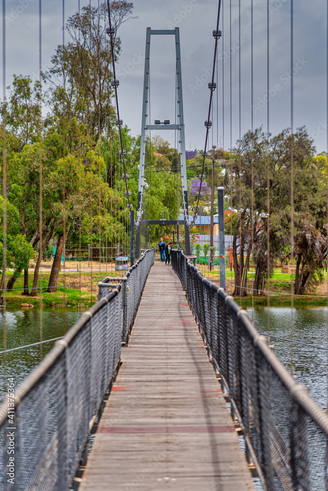 Stretching across the Avon River in Northam, the Suspension Bridge is ...