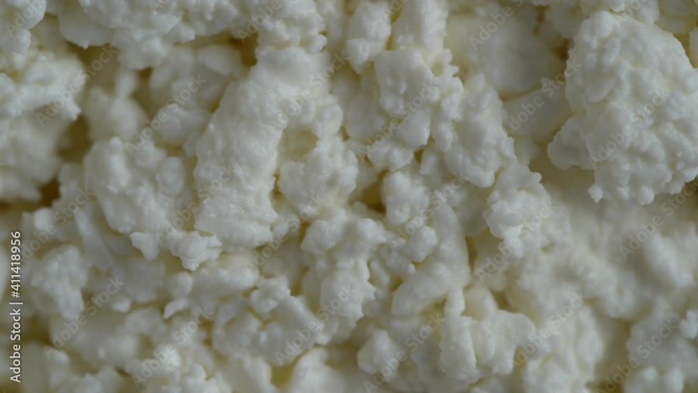 Cottage cheese of background, top view, rotates. White grainy texture ...