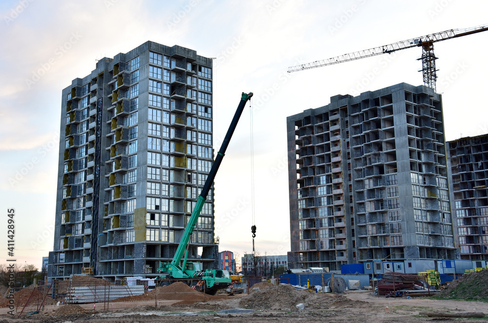 Mobile auto crane at construction site. Work of truck crane on project ...