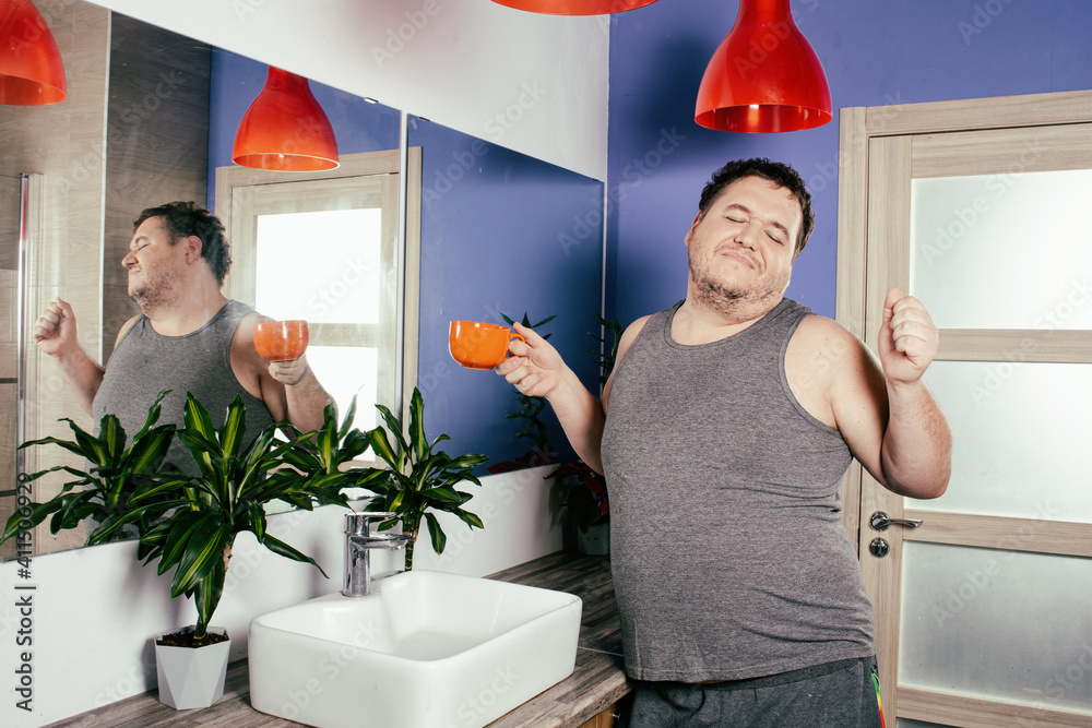 Good morning and funny fat man in the bathroom. Stock Photo | Adobe Stock