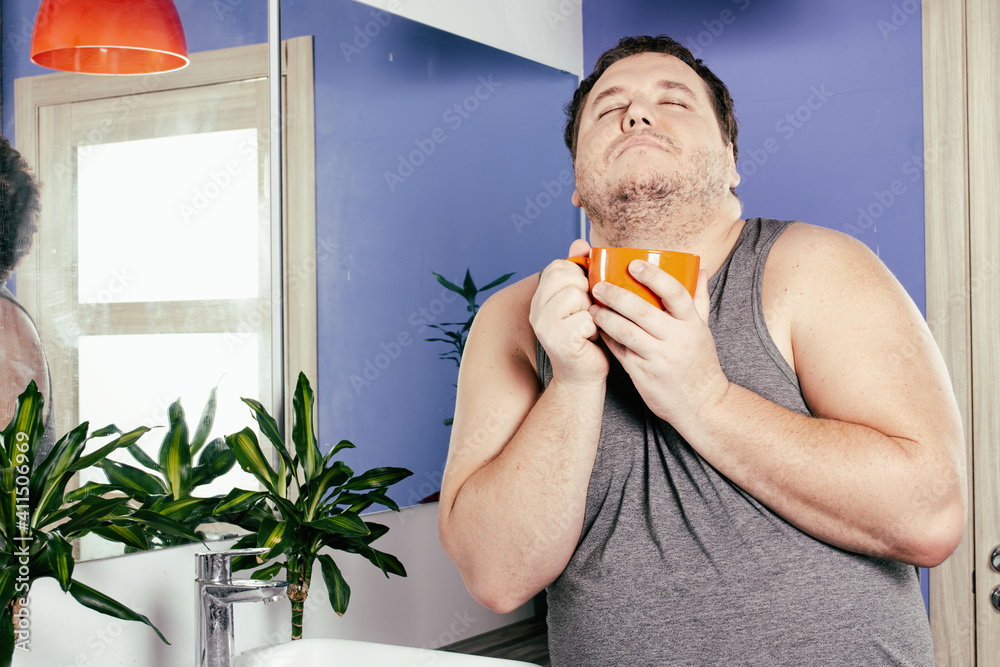 Good morning and funny fat man in the bathroom. Stock Photo | Adobe Stock