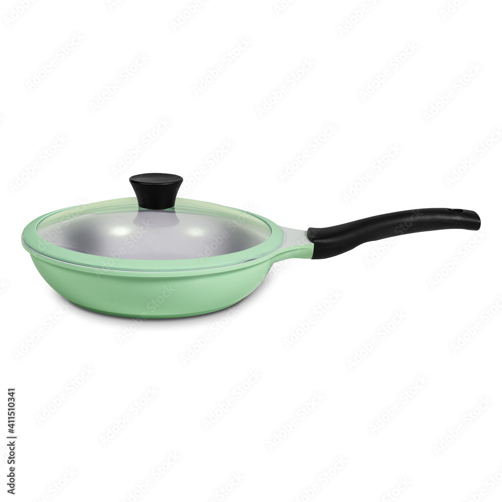 Round colored frying pan with a transparent lid in the form of a ...