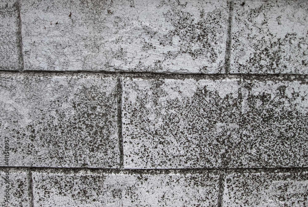 Stacked cinder block slabs with a rough surface. Background with ...