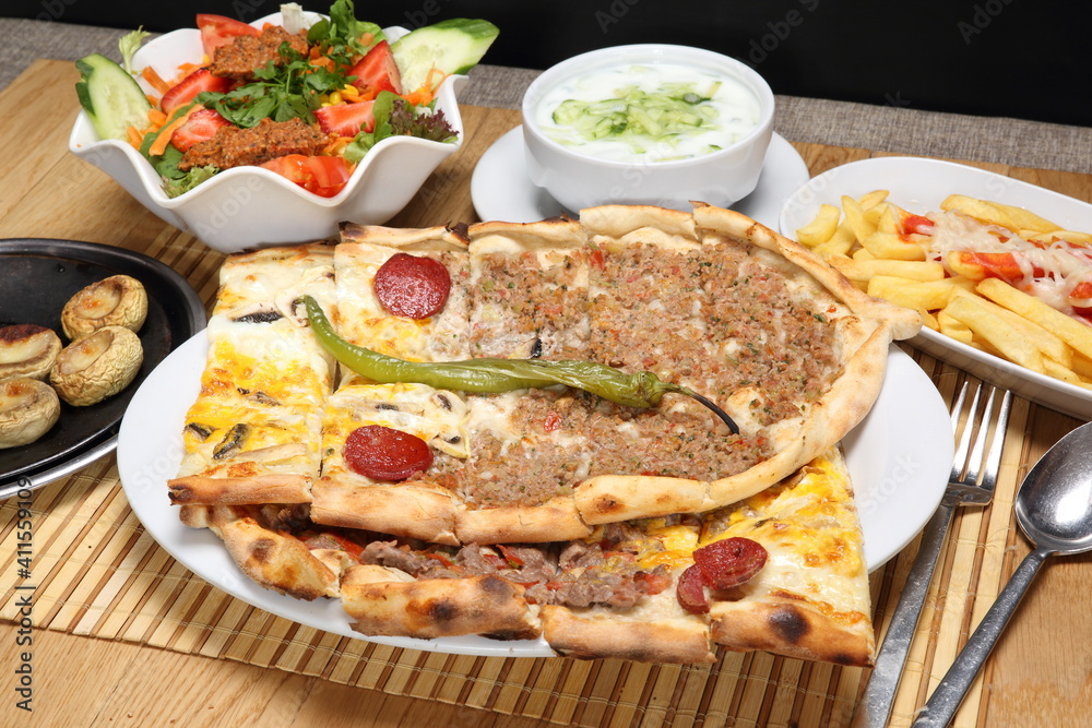 turkish mixed pitta with minced meat, cheddar cheese, chopped meat and ...
